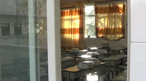 Looking into the messy empty classroom t... | Stock Video | Pond5