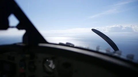 Looking out from the cockpit on a flight... | Stock Video | Pond5