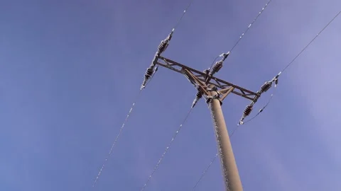 Looking up at utility pole with snow fal... | Stock Video | Pond5