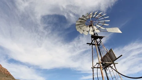 Looking up at a vintage windmill spinnin... | Stock Video | Pond5