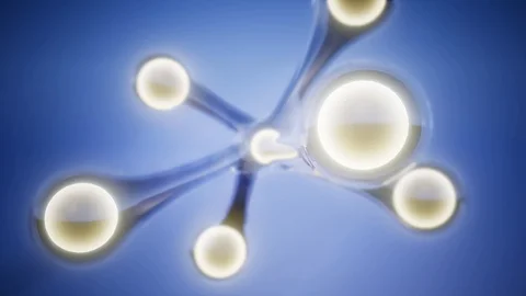 loop atom model on colored background | Stock Video | Pond5