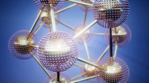 loop atom model on colored background | Stock Video | Pond5