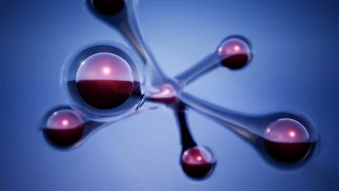 loop atom model on colored background | Stock Video | Pond5