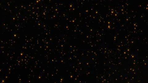 Loop glow orange gold star particles ani... | Stock Video | Pond5