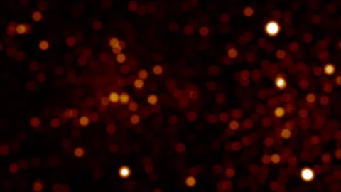 Loop gold orange bokeh particles on blac... | Stock Video | Pond5
