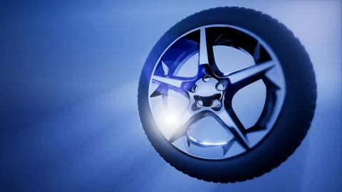 Loop Rotate Wheel on colored background | Stock Video | Pond5
