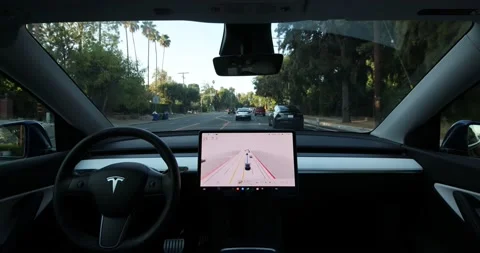 LOS ANGELES - AUG 22: A Tesla Model Y dr... | Stock Video | Pond5