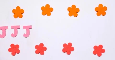 A lot of pink dancing letter J of the En... | Stock Video | Pond5