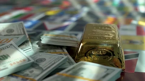 Lots of Gold and Dollars on World Flags | Stock Video | Pond5