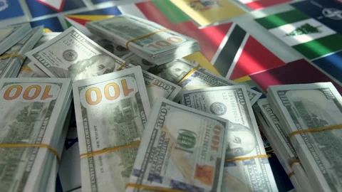 Lots of Gold and Dollars on World Flags | Stock Video | Pond5