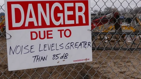 Loud noise warning signs at construction... | Stock Video | Pond5