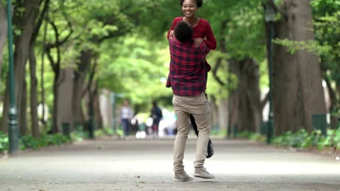 Love, hug and spinning with black couple... | Stock Video | Pond5