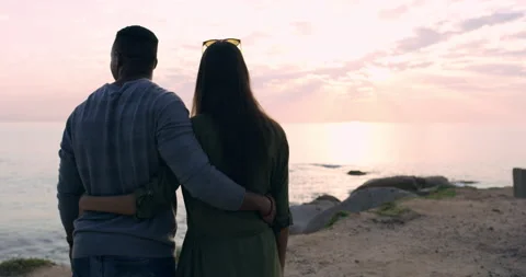 Love, sunset and back view of couple at ... | Stock Video | Pond5