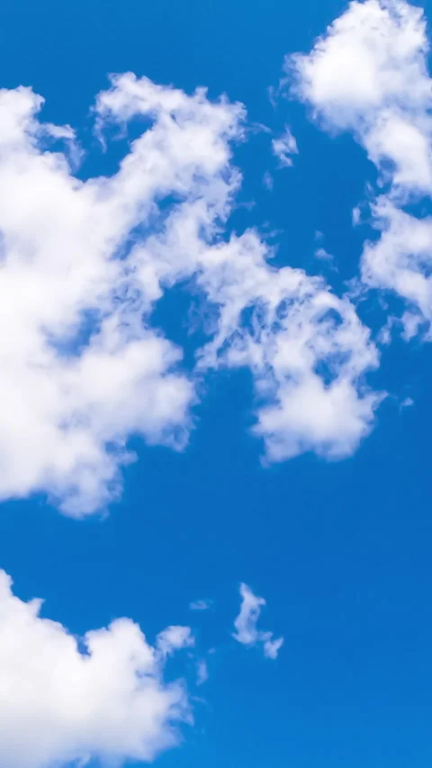 Lovely azure sky with little fluffy clou... | Stock Video | Pond5