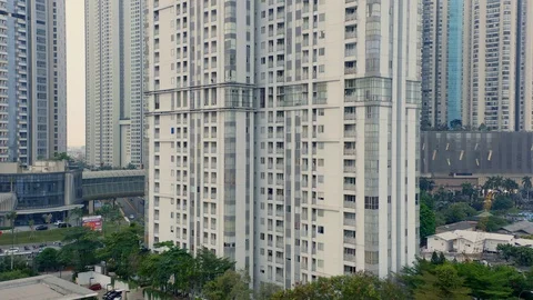 Low Aerial across tall buildings in Jaka... | Stock Video | Pond5