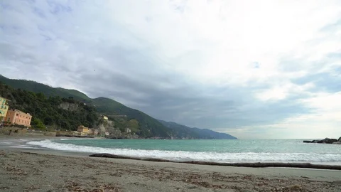 Low angle blue water of sea lap at sandy... | Stock Video | Pond5