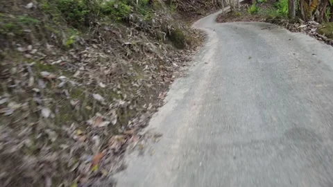 Low angle gimbal go up the hill by cemen... | Stock Video | Pond5