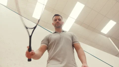 Low angle of a player bouncing the ball | Stock Video | Pond5