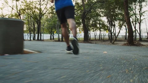 Low angle shot Close-up legs young man r... | Stock Video | Pond5