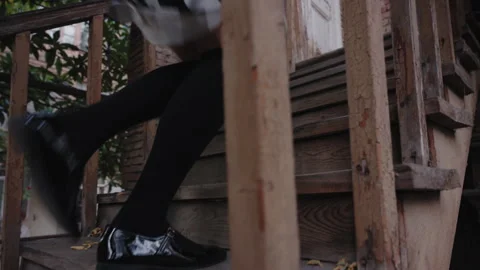A low angle shot of a girl's legs in lon... | Stock Video | Pond5