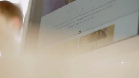 Low angle shot looking on a computer scr... | Stock Video | Pond5