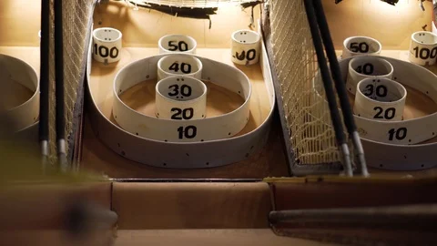 Low angle Shot of a Skee-Ball rolling up... | Stock Video | Pond5