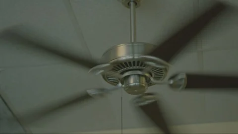 Low Angle Shot of a Spinning Ceiling Fan... | Stock Video | Pond5
