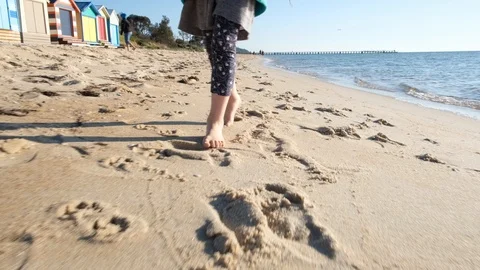 Low angle tracking shot of young girl's ... | Stock Video | Pond5