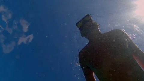 Low angle underwater view of man with di... | Stock Video | Pond5
