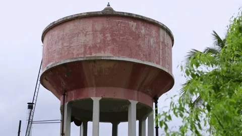 A low-angle view of the big water tank f... | Stock Video | Pond5