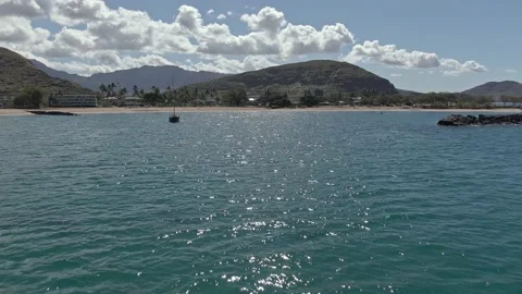 Low angle view of Pokai beach skimming a... | Stock Video | Pond5