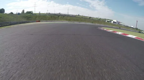 LOW ANGLE VIEW: Race car competing and d... | Stock Video | Pond5