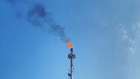 Low angle zoom in of burning Gas Flare s... | Stock Video | Pond5