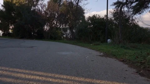 Low follow shot of road on a mountain le... | Stock Video | Pond5