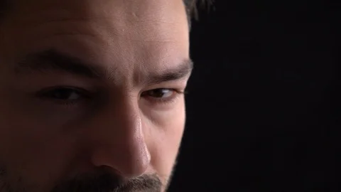 Low-key portrait of scary man with evil ... | Stock Video | Pond5