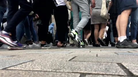 Low Shot On Floor Of Peoples Feet Walkin... | Stock Video | Pond5