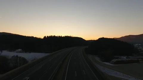 Low traffic highway in morning yellow li... | Stock Video | Pond5