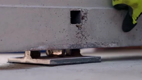 Lowering of concrete beam onto steel anc... | Stock Video | Pond5