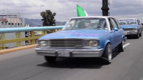 Lowrider cars parade through Mexico City... | Stock Video | Pond5
