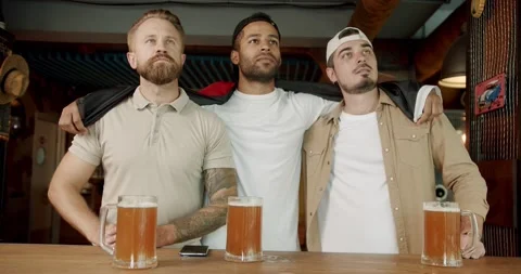 Loyal football fans supporting their tea... | Stock Video | Pond5