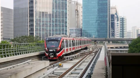 Lrt train on the rail track | Stock Video | Pond5