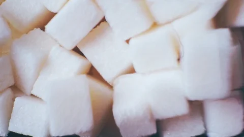 lump sugar in cubes.closeup.Abstract mot... | Stock Video | Pond5