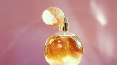 Luxury golden perfume bottle and shining... | Stock Video | Pond5