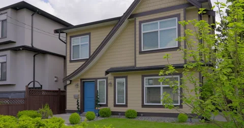 luxury house with big tree and nice land... | Stock Video | Pond5