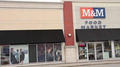m and m food market front entrance with ... | Stock Video | Pond5