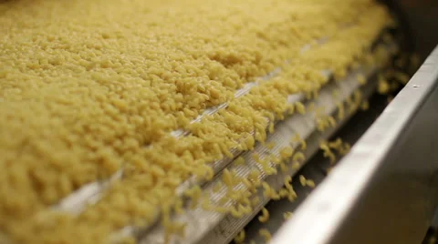 Macaroni falling down in a la carte mach... | Stock Video | Pond5