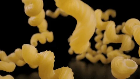 Macaroni Pasta Falling Down black backgr... | Stock Video | Pond5