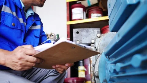 Machine condition inspection by engineer... | Stock Video | Pond5