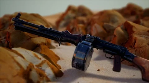 machine gun at the sand | Stock Video | Pond5