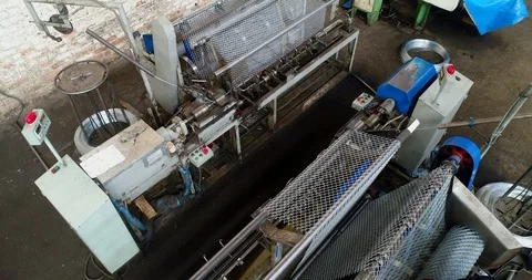 Machine for the production of metal mesh... | Stock Video | Pond5